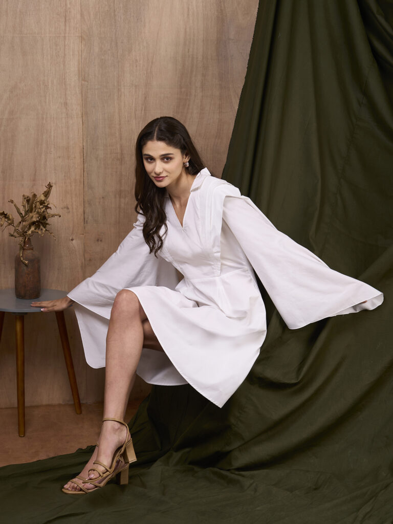 White Resort wear dress with wide bell sleeves - Mish India