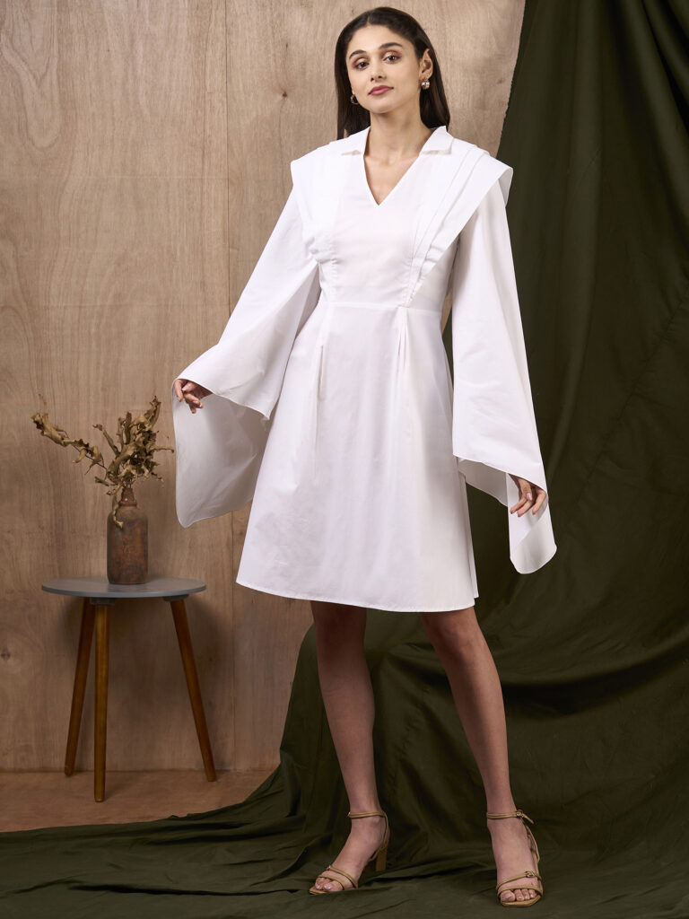 White Resort wear dress with wide bell sleeves - Mish India